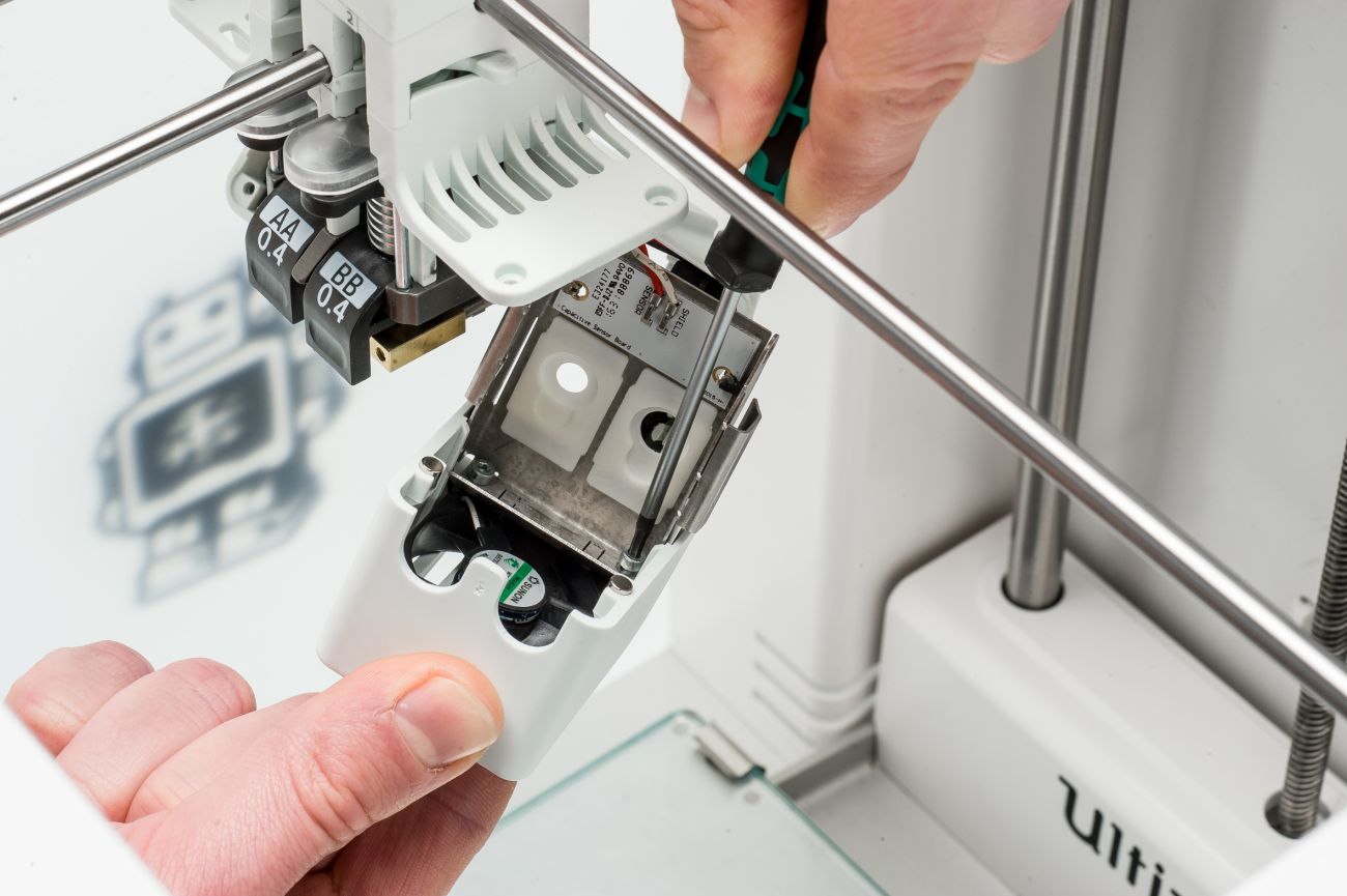 Replacing the print head axial fan (front fan)