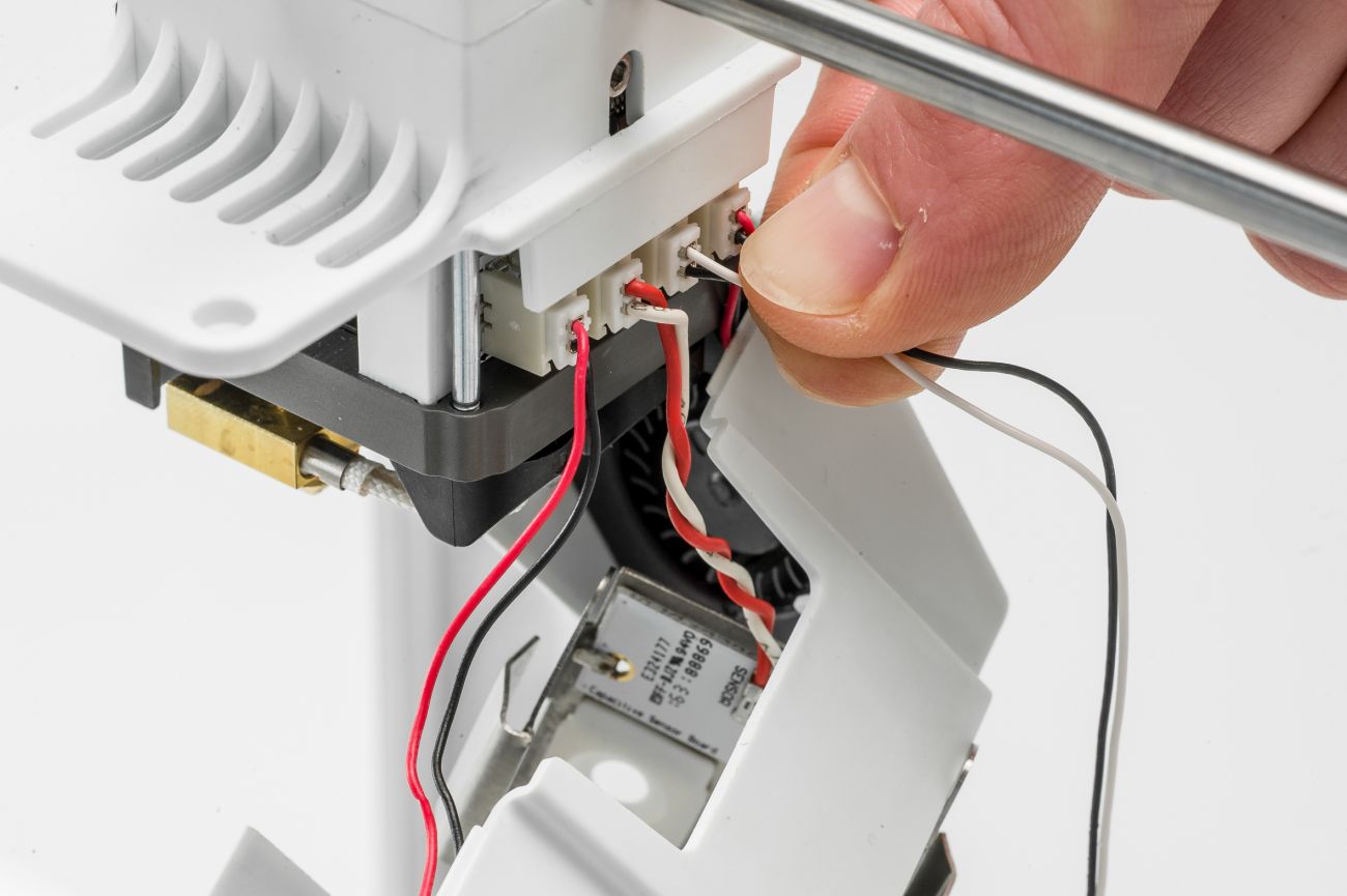 Replacing the print head axial fan (front fan)